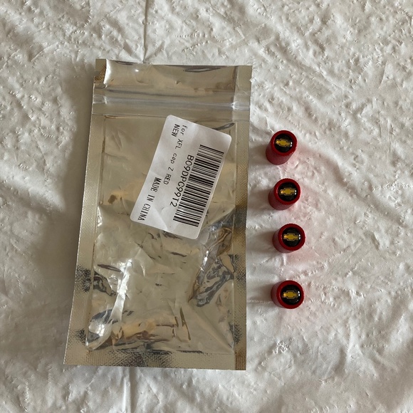 Other | Red Valve Stem Covers Wgold Chevy Emblem On Black Background ...